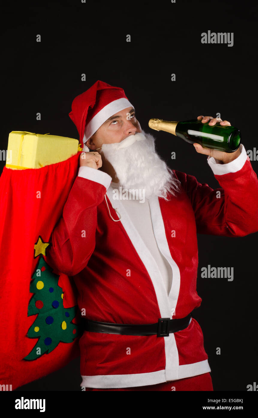 A frustrated Santa about to become an alcoholic Stock Photo - Alamy