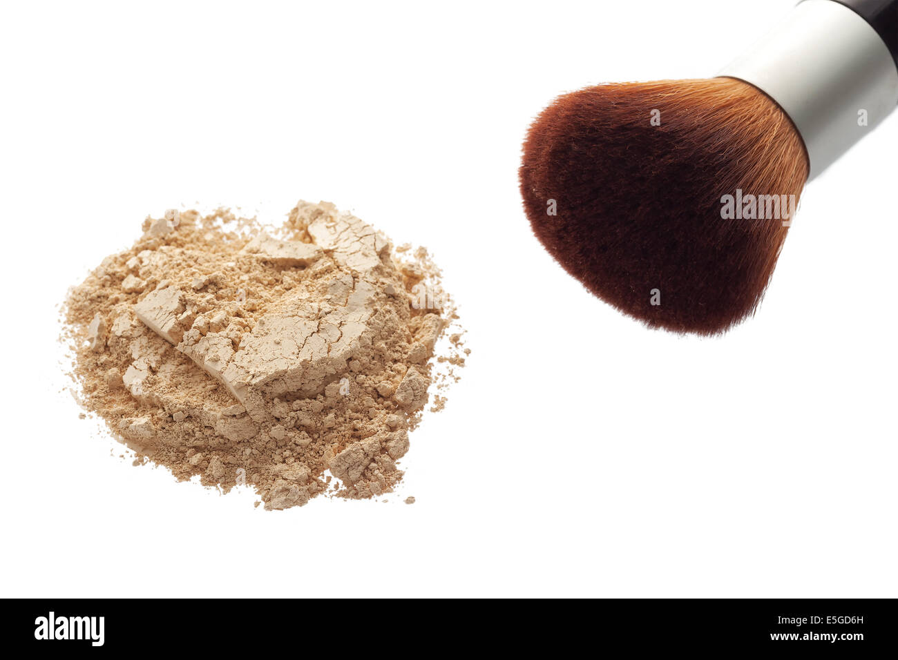 Mineral makeup powder with brush on white background Stock Photo - Alamy