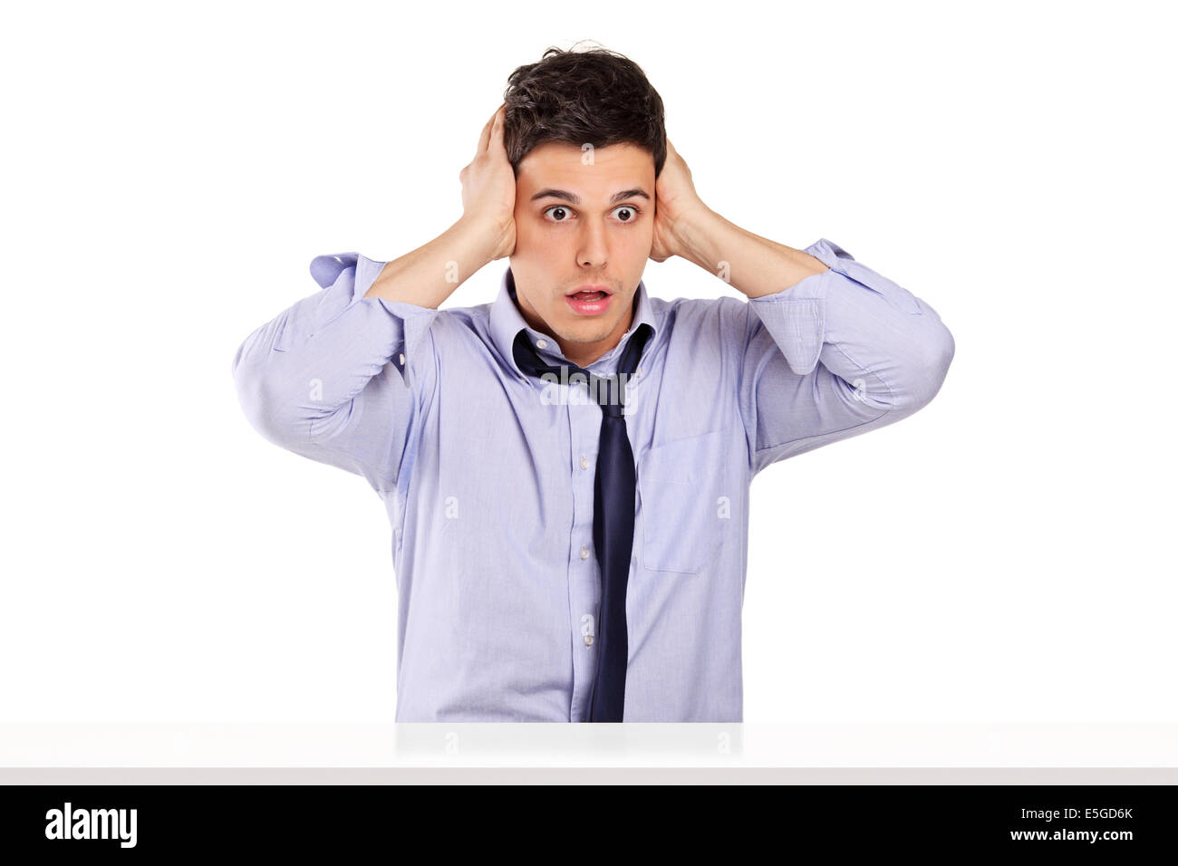 Man holding head in disbelief hi-res stock photography and images - Alamy