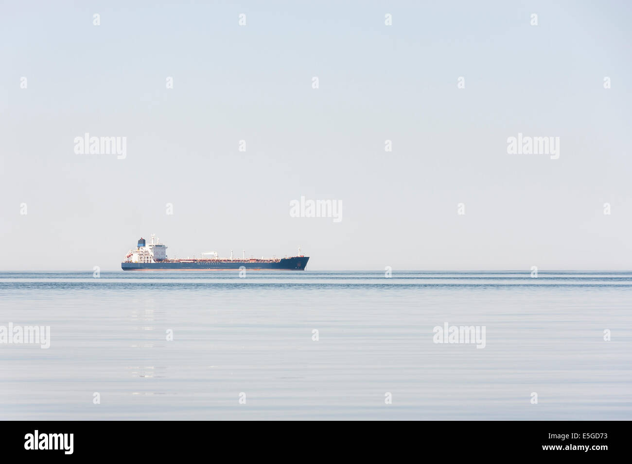 Big tanker or freighter at ocean Stock Photo - Alamy