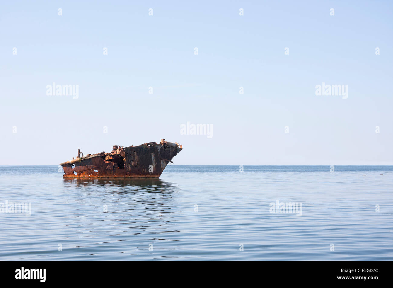 Old rusty ship wreck in the sea Stock Photo - Alamy