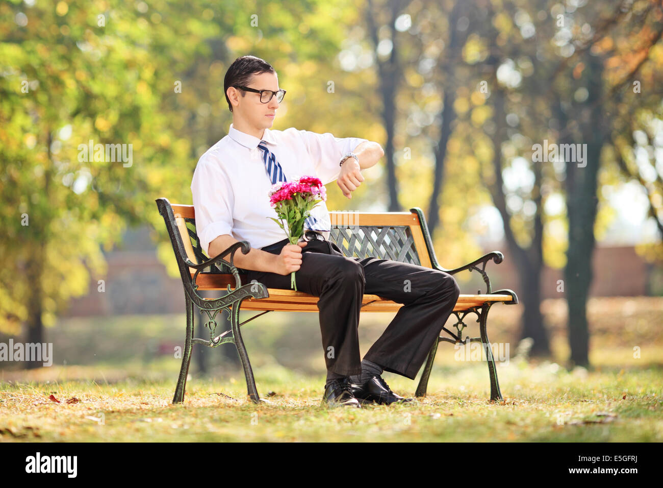 Waiting sitting clock watch watching the clock watch hi-res stock ...