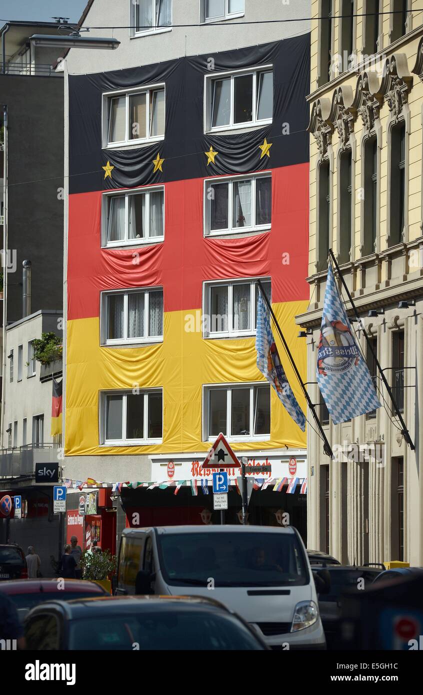 Cologne, Germany. 31st July, 2014. A huge German flag covers the front ...