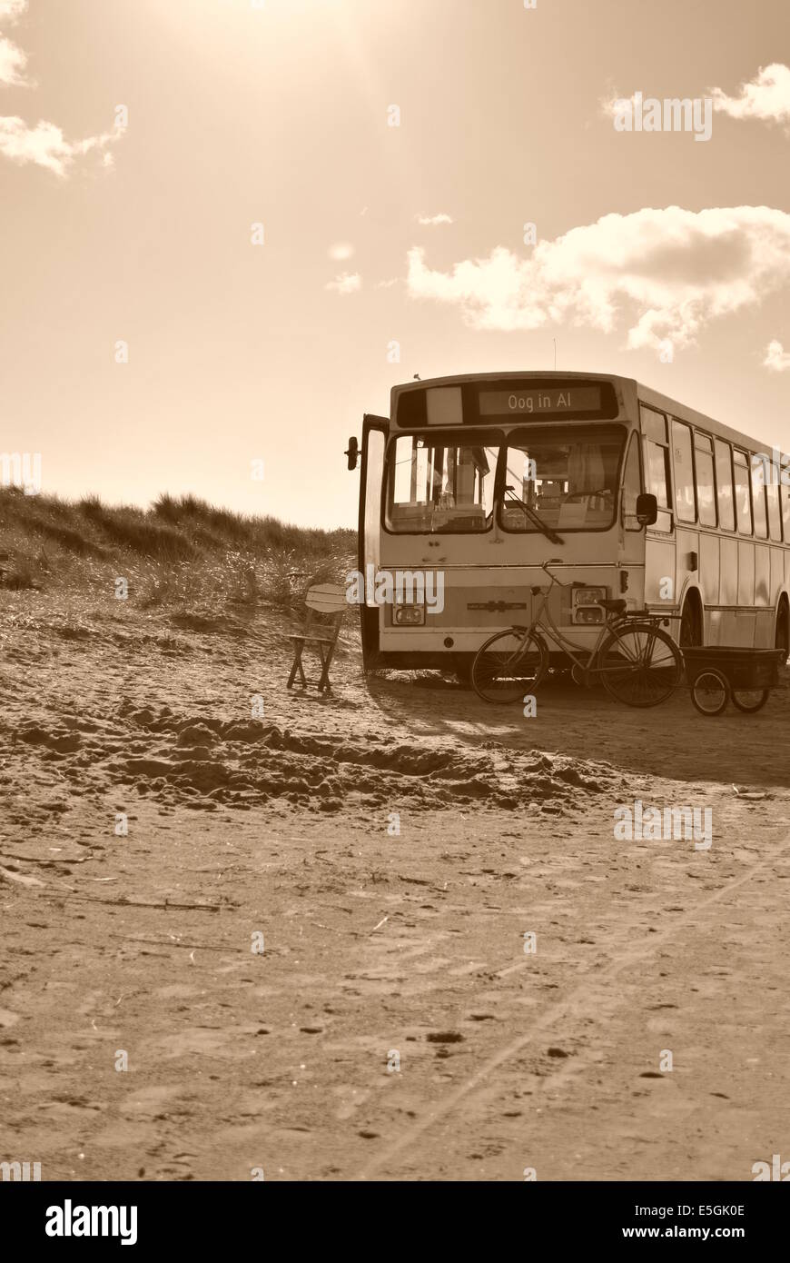 An abandoned bus on a beach in the Netherlands serves as an artist's ...