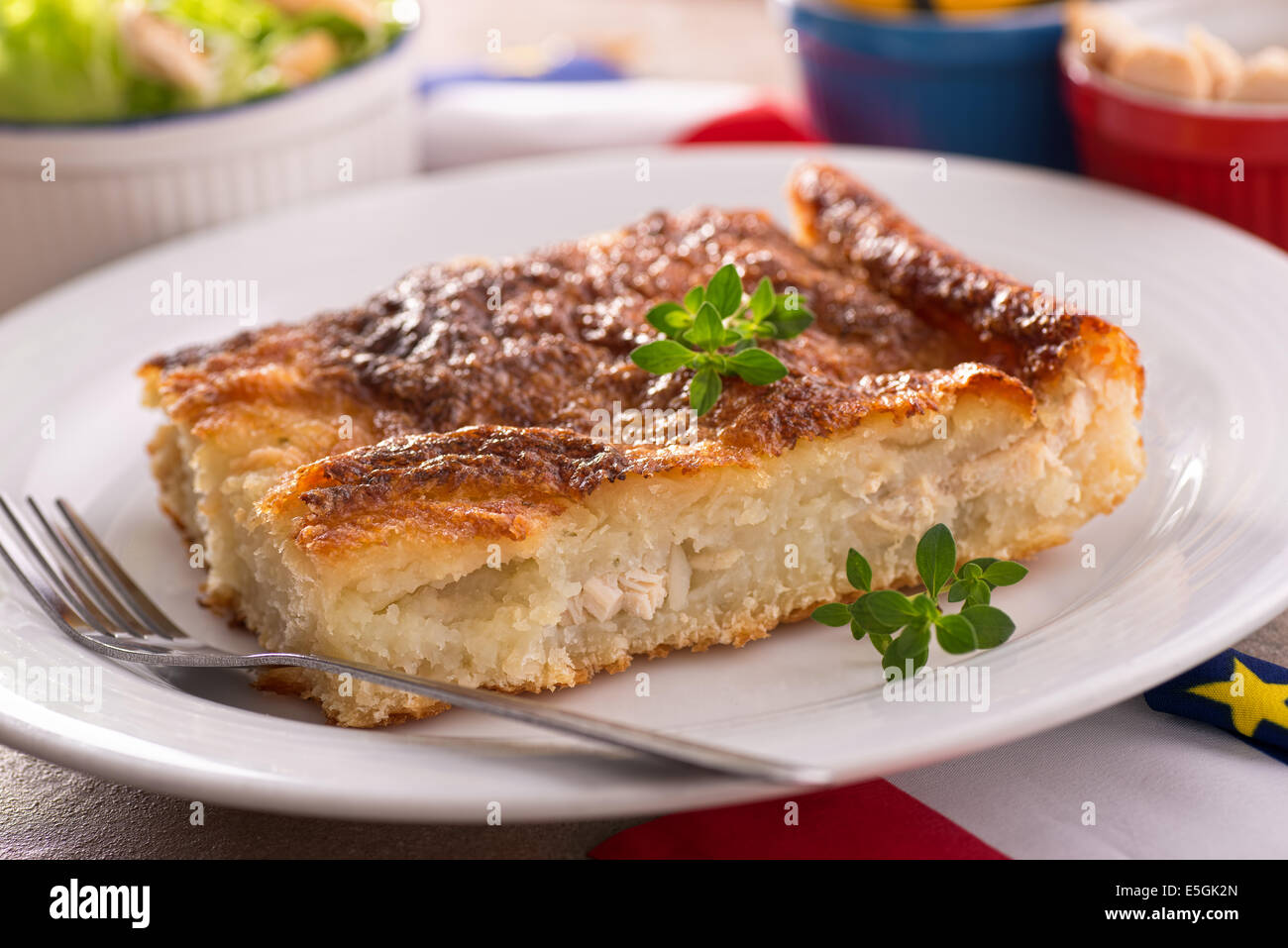 A freshly baked acadian rappie pie with grated potatoes and chicken ...