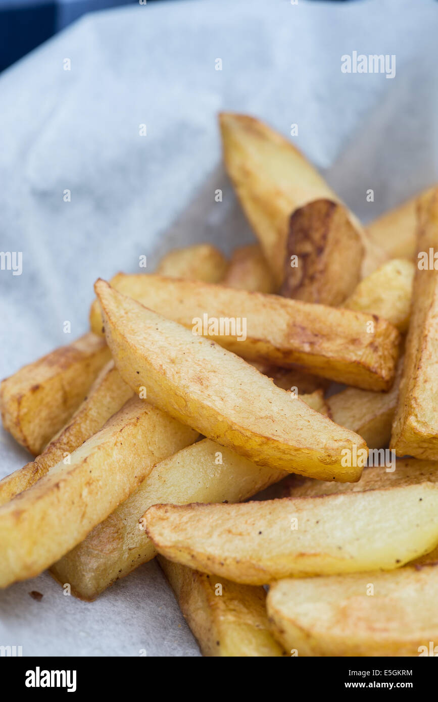Tasty hand cut home made potato chips fries Stock Photo - Alamy
