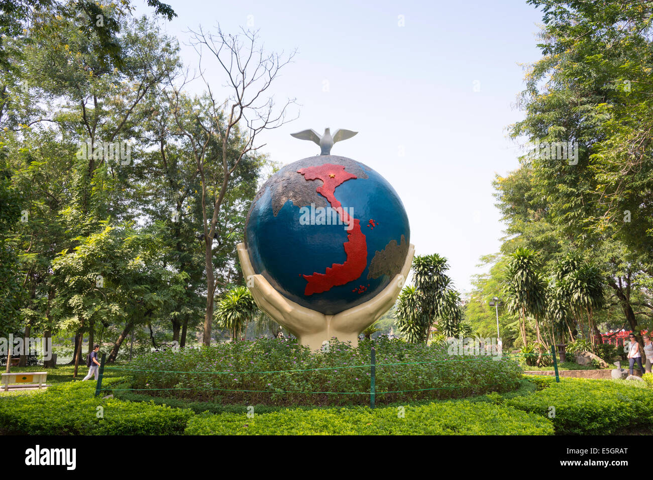 Peace sculpture - hands holding a globe. Hanoi, Socialist Republic of ...