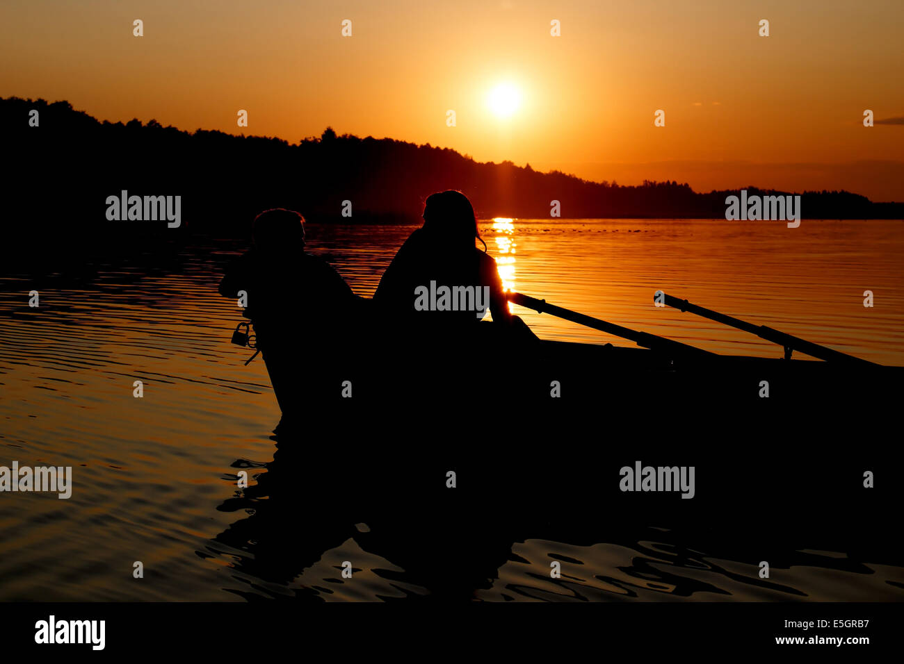 Young couple making romance in the boat Stock Photo - Alamy
