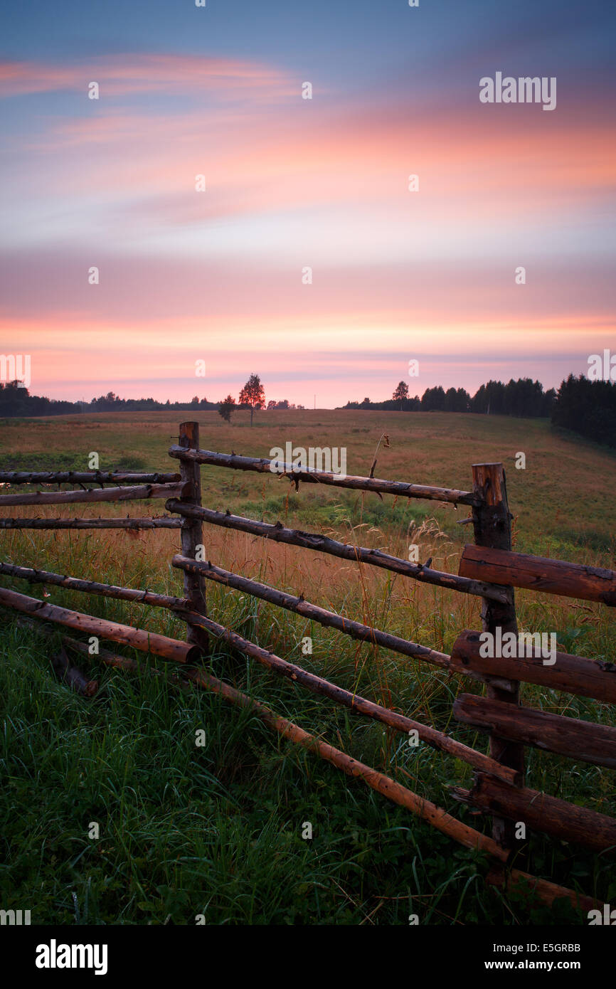 retro styled fence on farmland Stock Photo - Alamy
