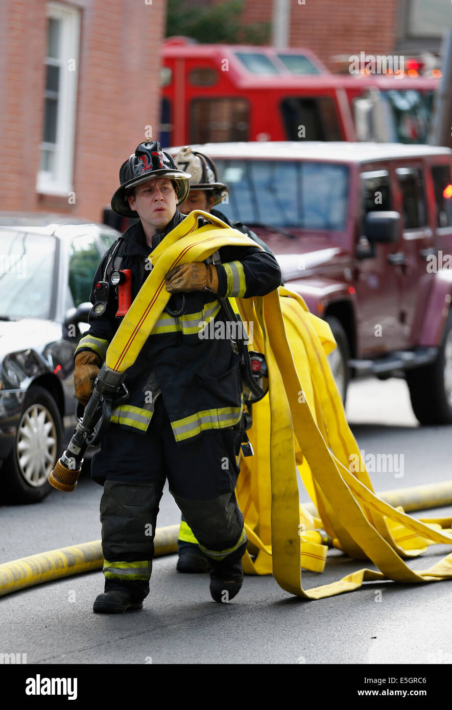Firefighter responding to fire hi-res stock photography and images - Alamy
