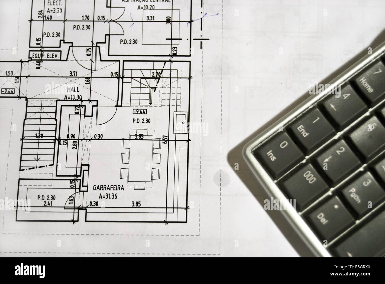 Close up photo of architecture plan with calculator Stock Photo - Alamy