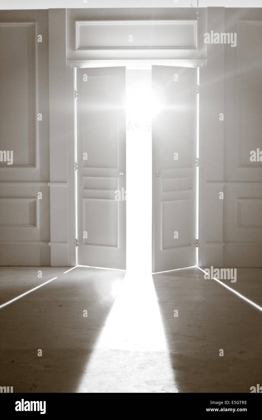 Opened Door With Bright Light Stock Photo - Alamy