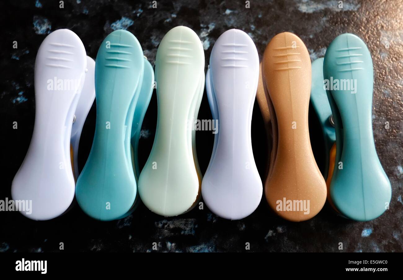 various colored clothes pegs Stock Photo - Alamy