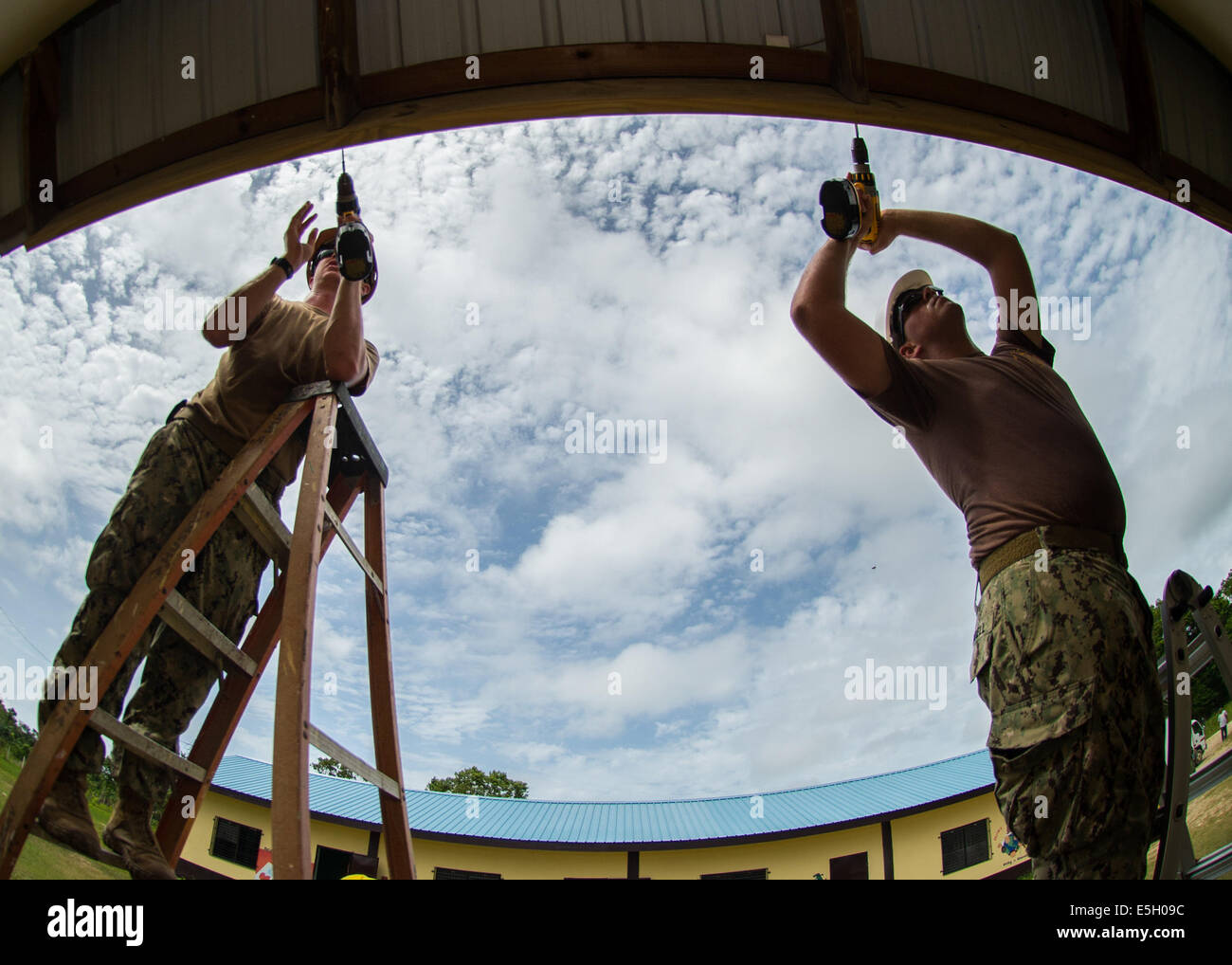 U.S. Navy Builder 3rd Class Matthew Wyatt and Engineering Aide 3rd ...