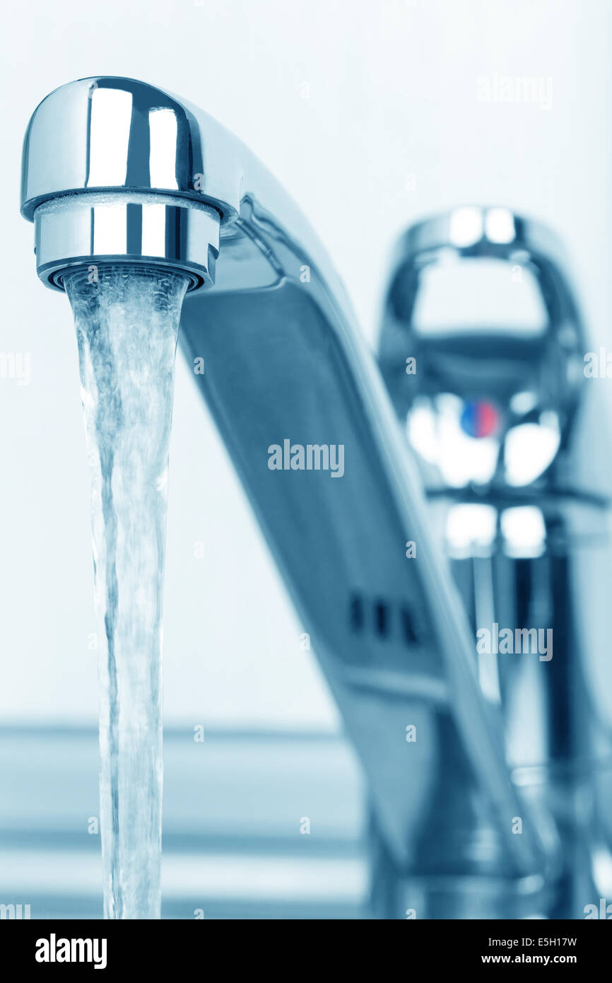 Faucet and water drop Stock Photo - Alamy