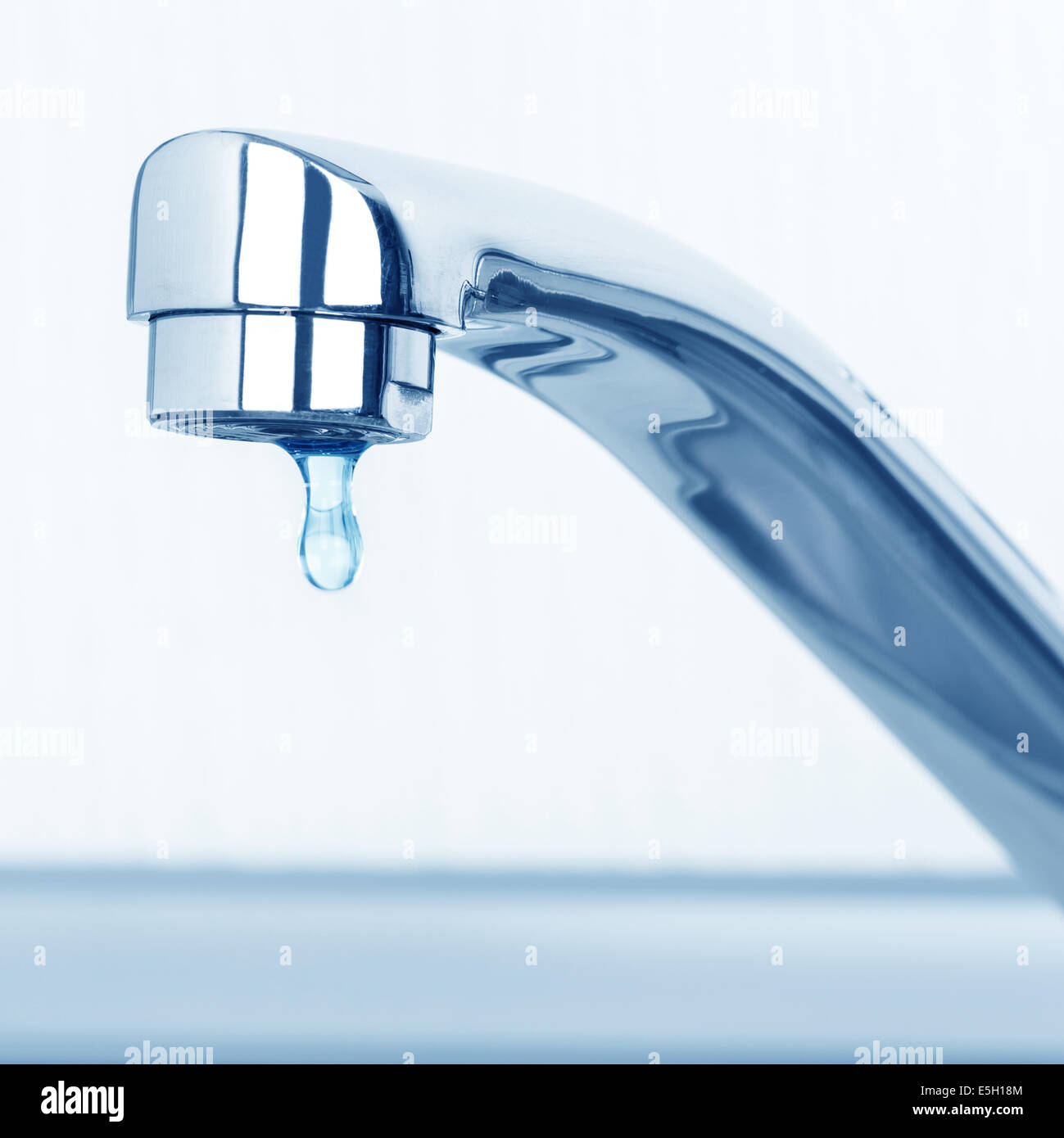 Faucet and water drop Stock Photo - Alamy