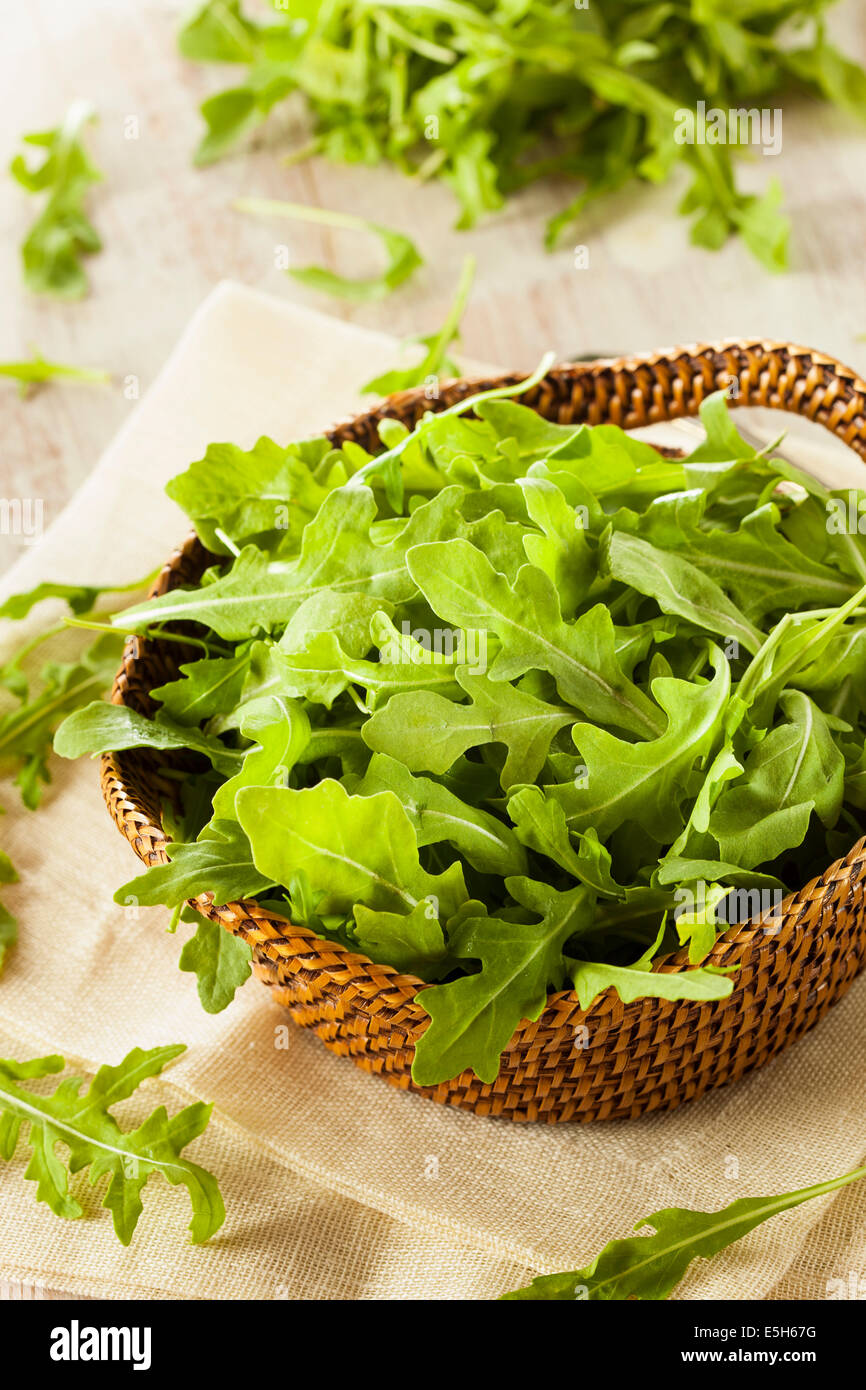 Organic Raw Green Arugula in a Basket Stock Photo - Alamy
