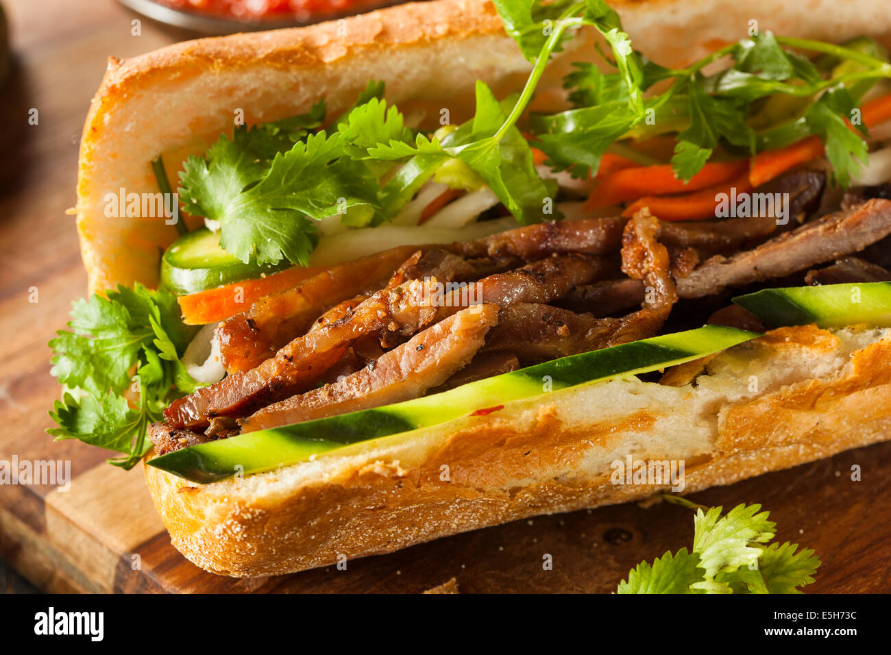 Vietnamese Pork Banh Mi Sandwich with Cilantro and Daikon Stock Photo ...
