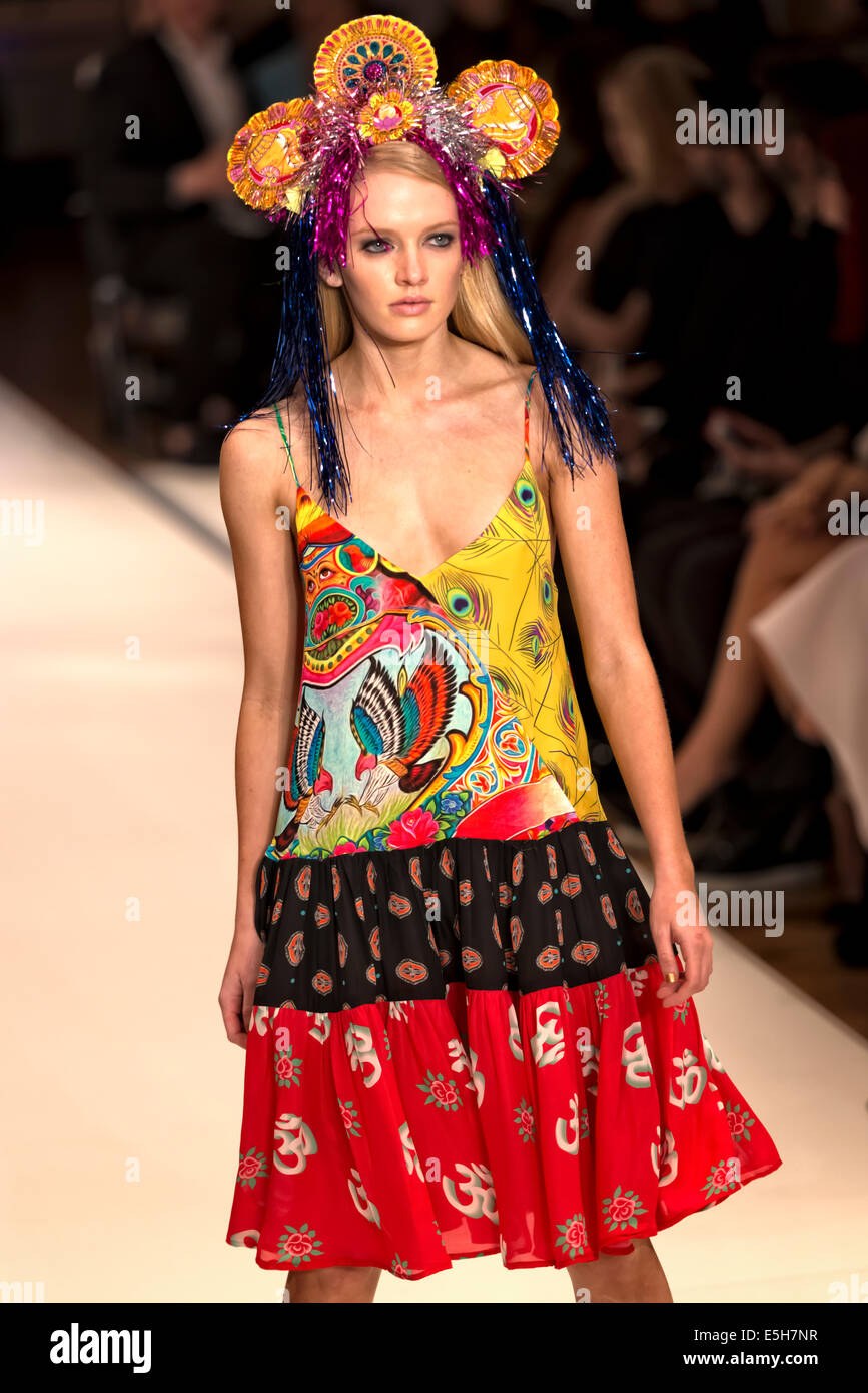 Sydney, Australia. 30th July, 2014. Models walk the runway in colourful ...