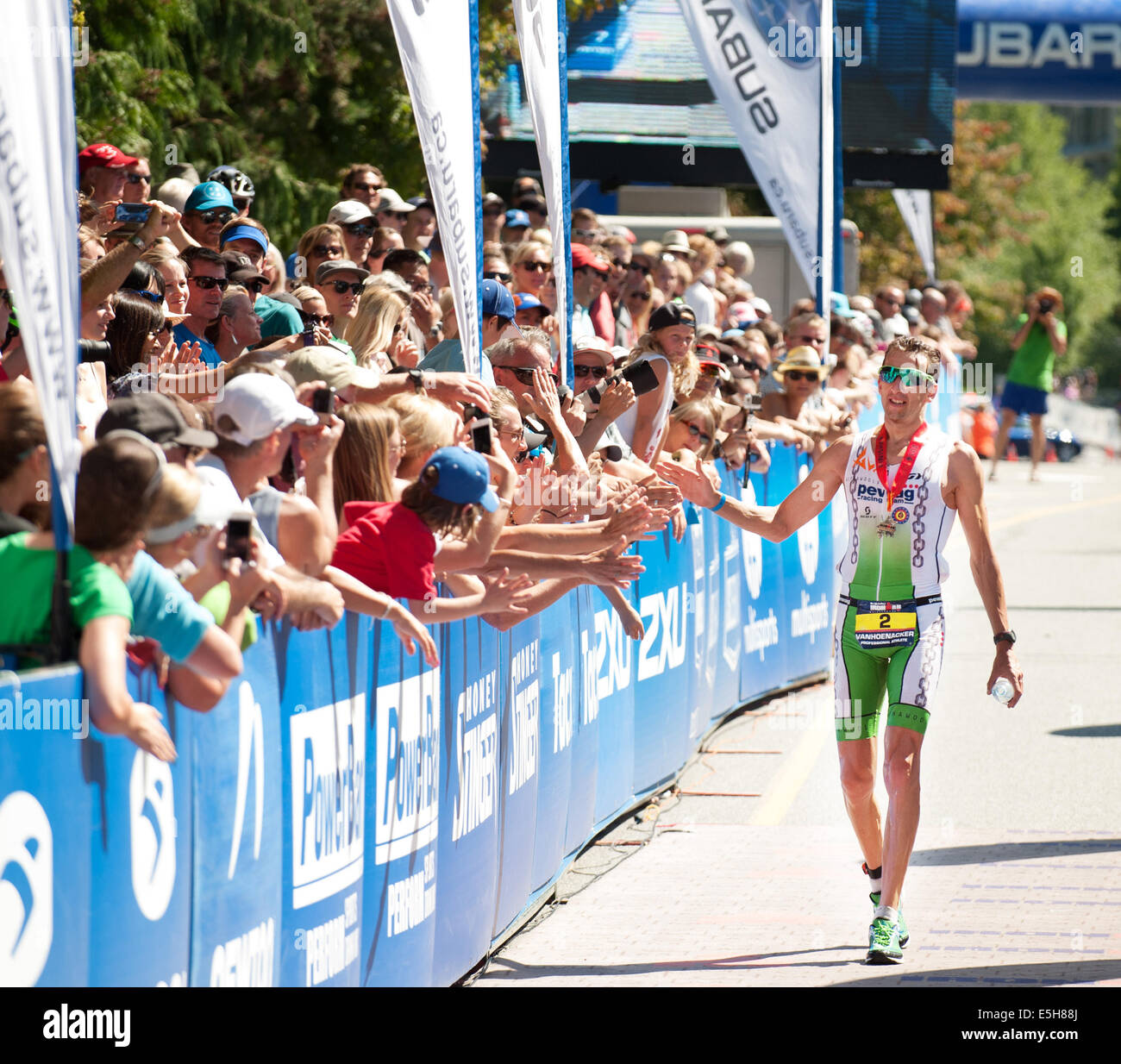 Ironman race winner finish hi-res stock photography and images - Alamy
