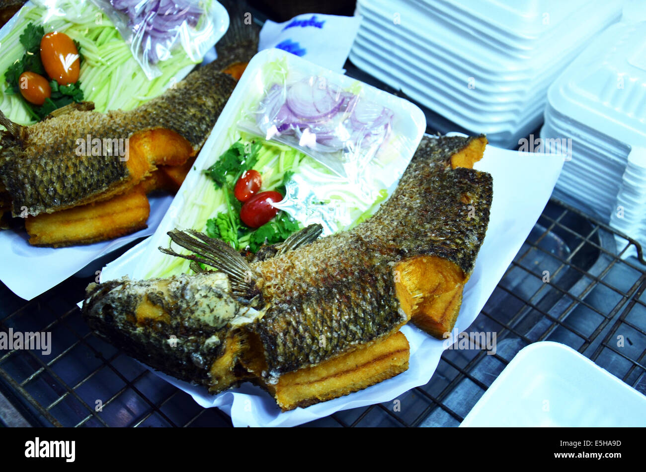 Snake-head fish Deep Fried serve with Herb and Spicy Sauce Stock Photo ...