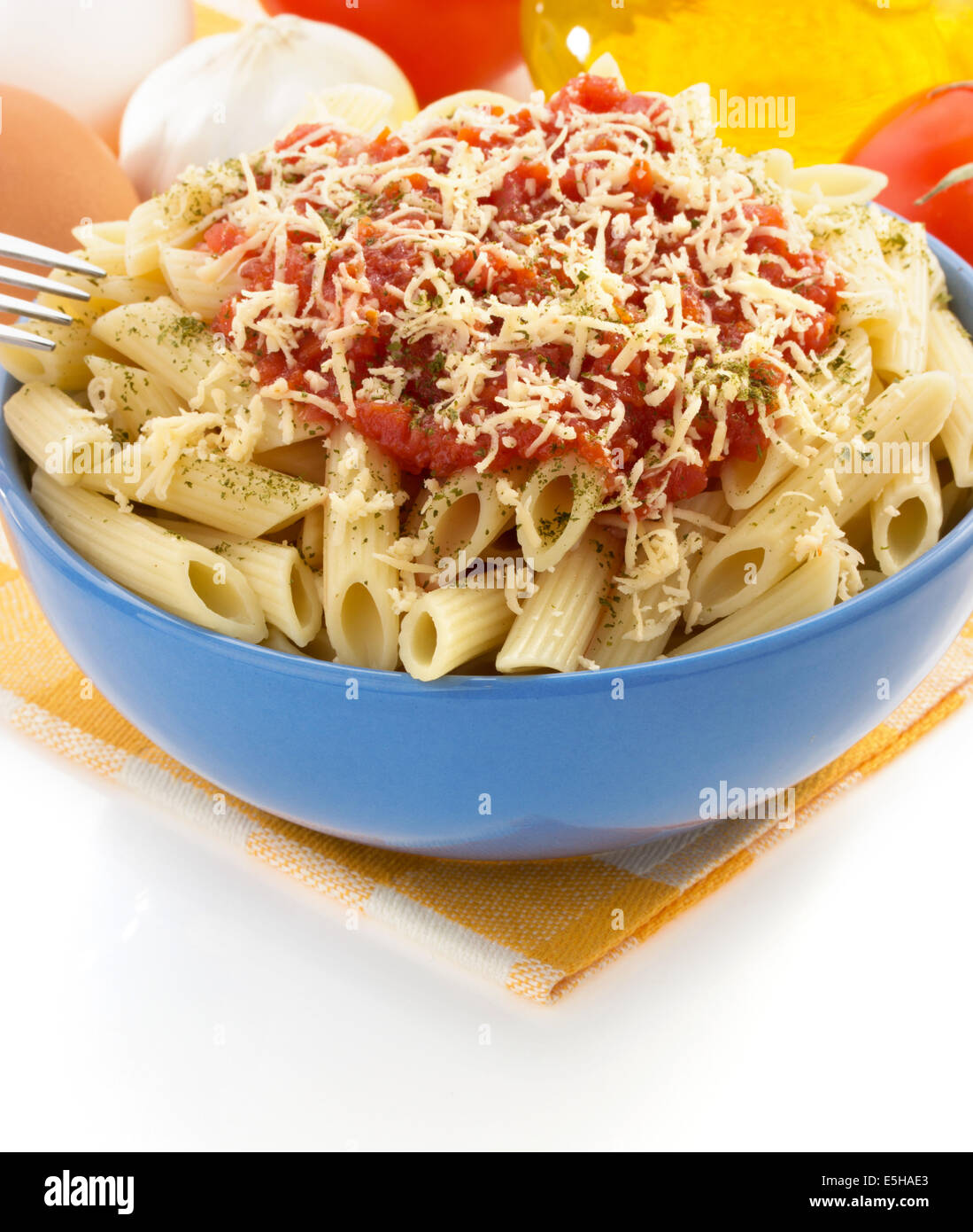 pasta Penne in plate isolated on white background Stock Photo - Alamy