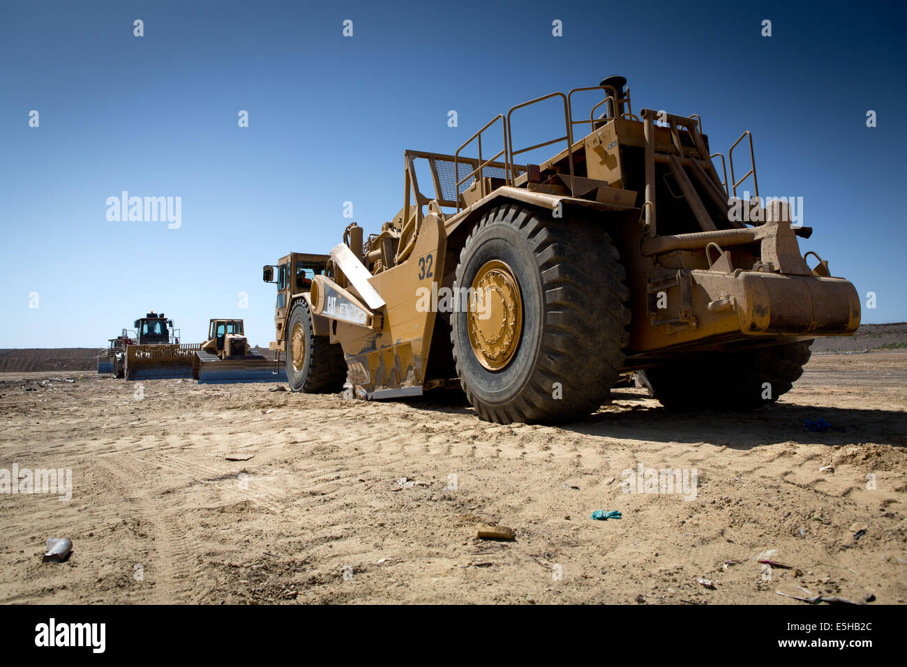 A Caterpillar 657G open bowl scraper at a landfill. Almost 910,000 tons of waste are disposed ...