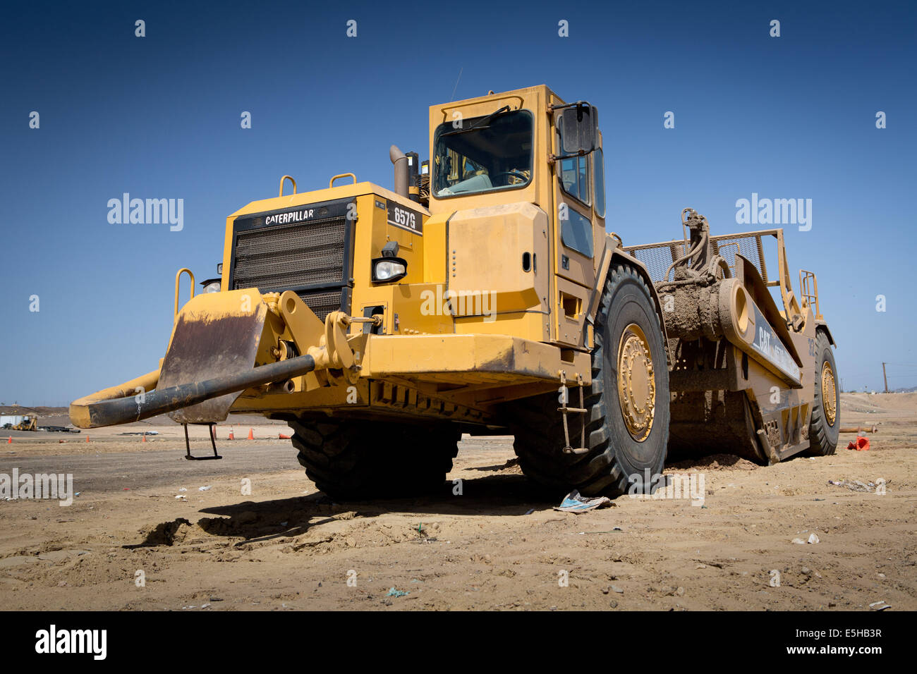 A Caterpillar 657G open bowl scraper at a landfill. Almost 910,000 tons ...