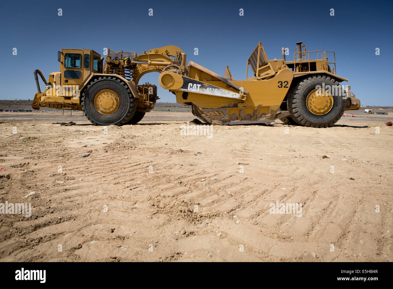 A Caterpillar 657G open bowl scraper at a landfill. Almost 910,000 tons of waste are disposed ...