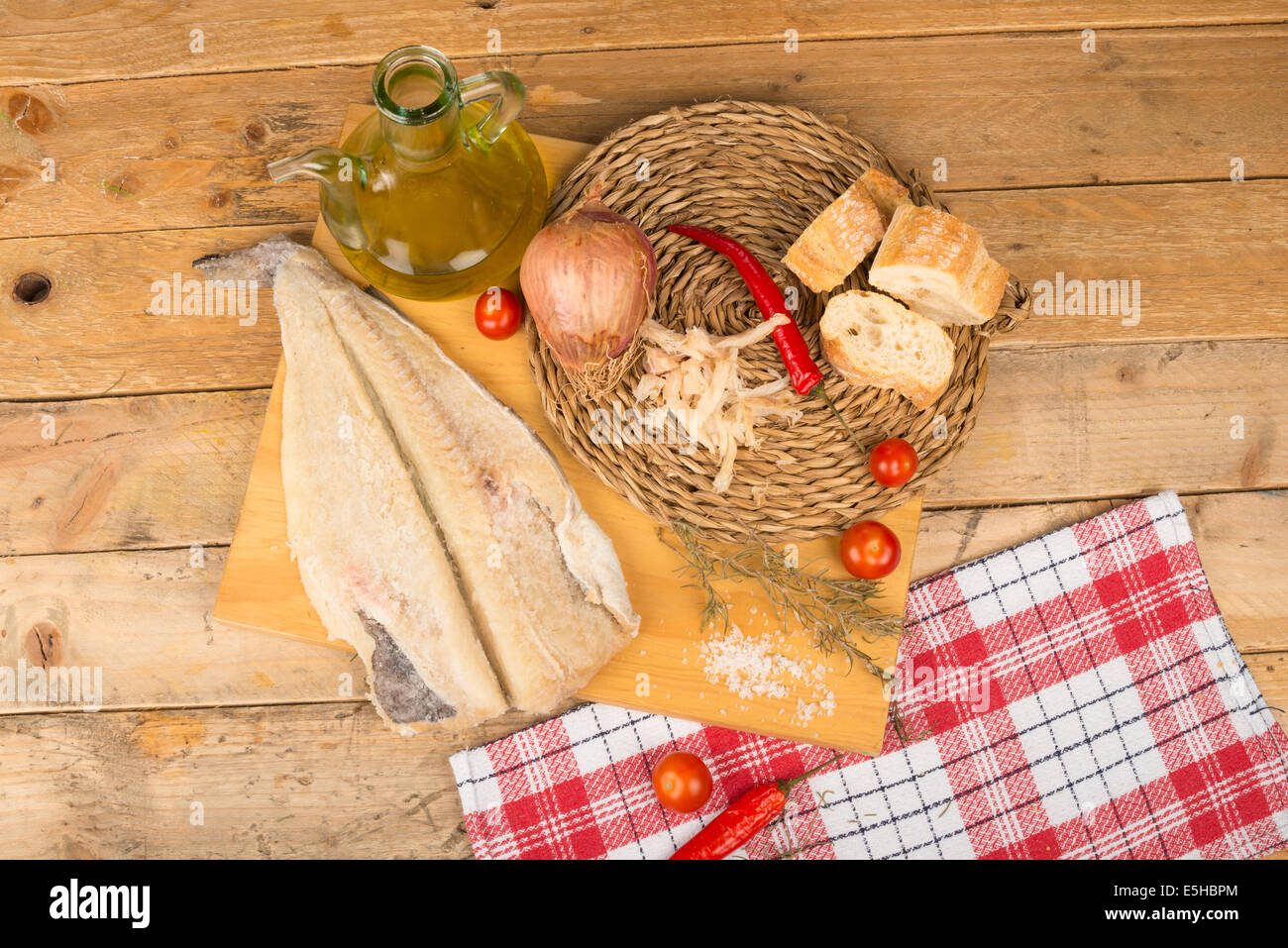 Still life with salt cured cod fish and Mediterranean ingredients Stock ...
