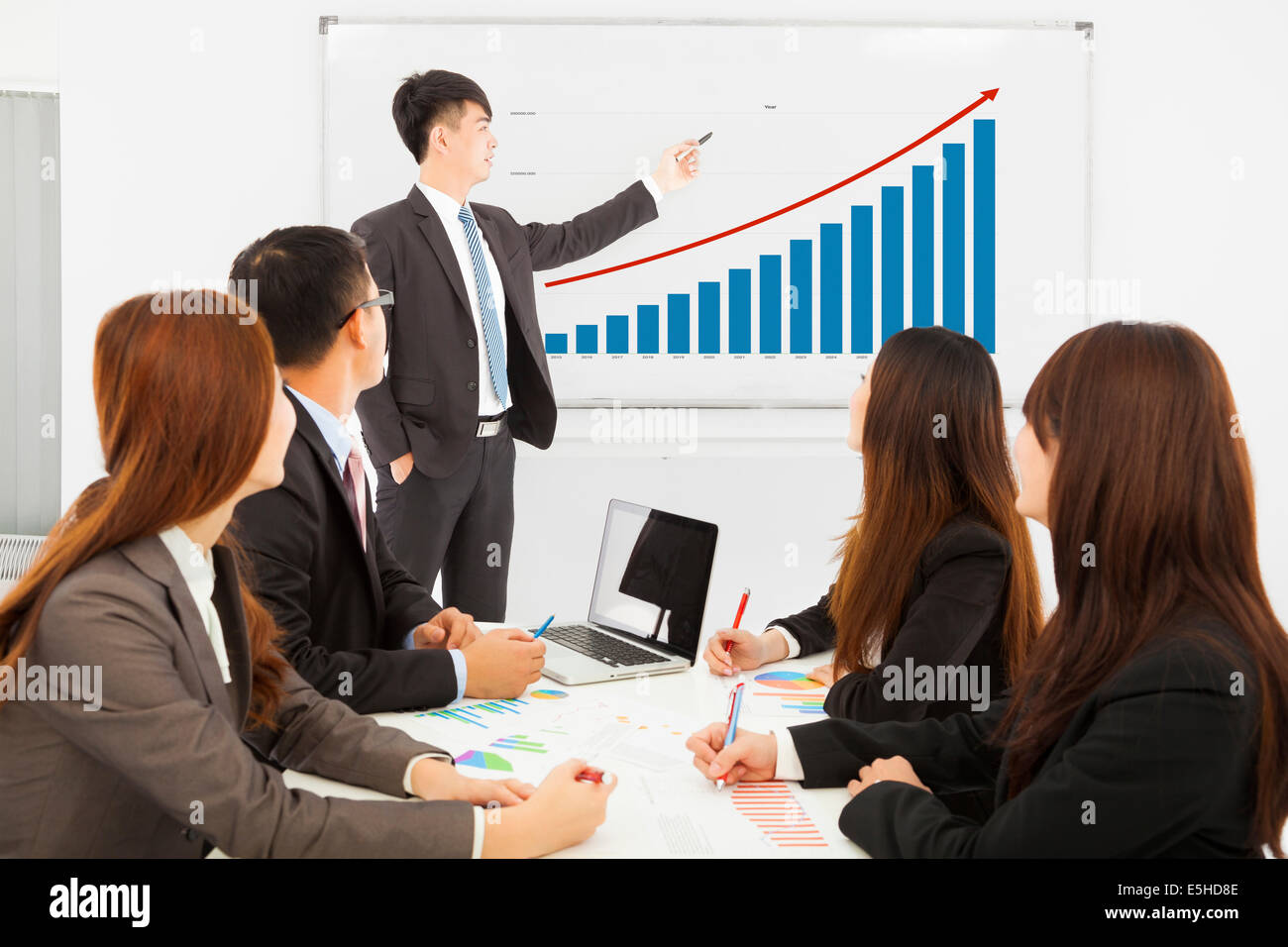 professional business man showing a market situation chart Stock Photo ...