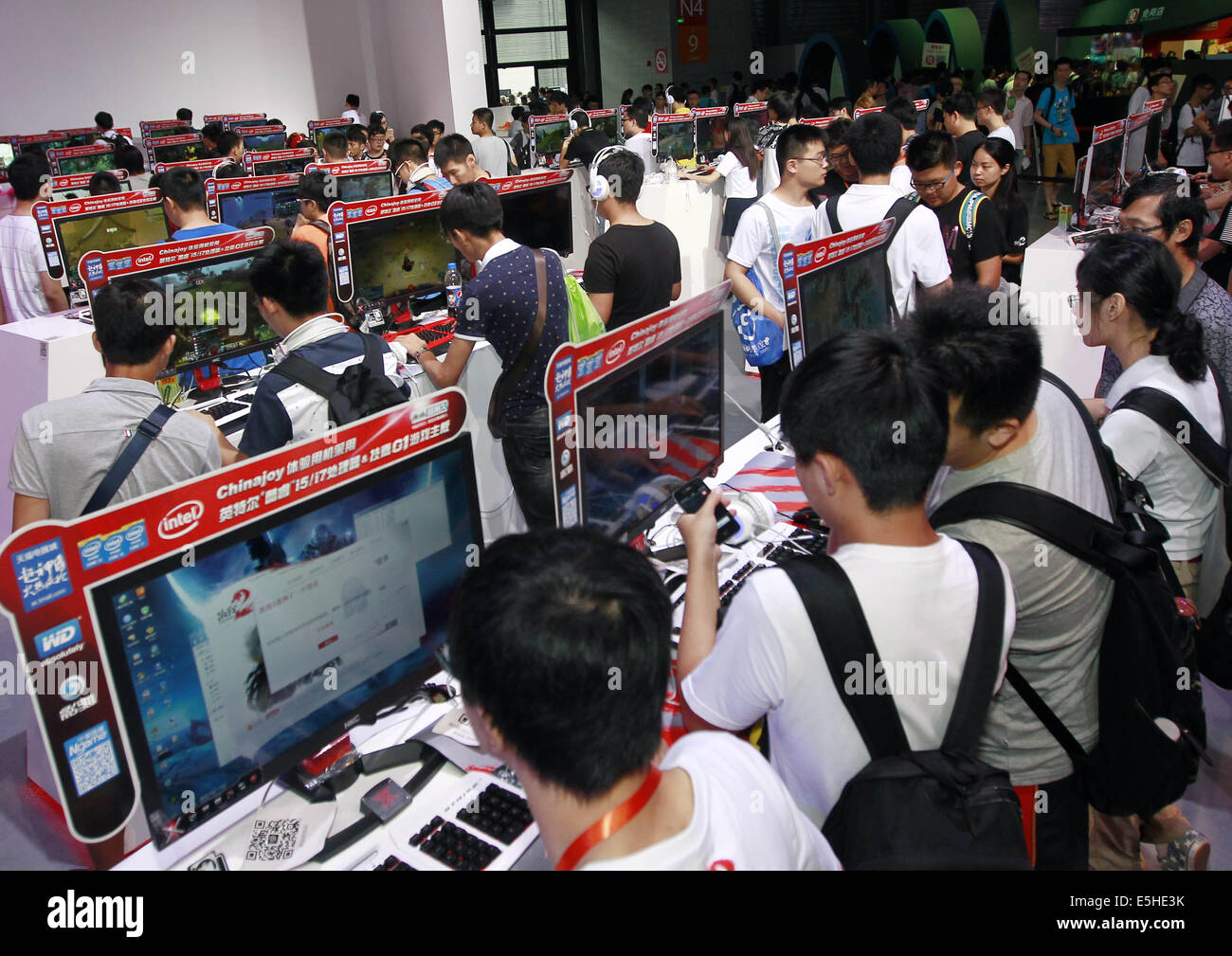 Shanghai, China. 1st Aug, 2014. Visitors play games at the 12th China ...