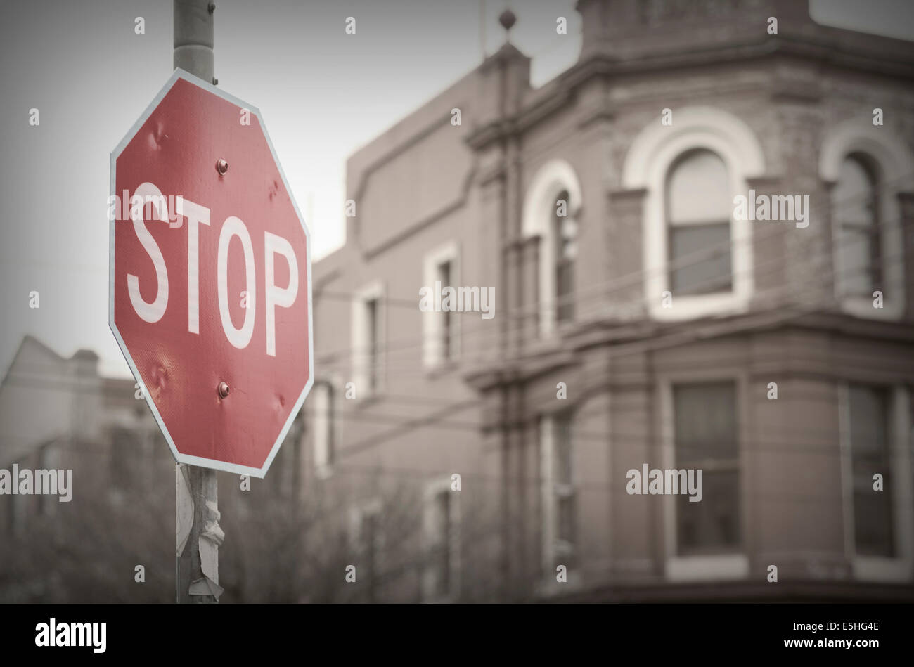 Stop Sign and Building Stock Photo - Alamy
