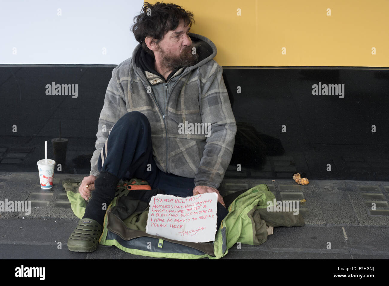 Homeless man begging Stock Photo - Alamy