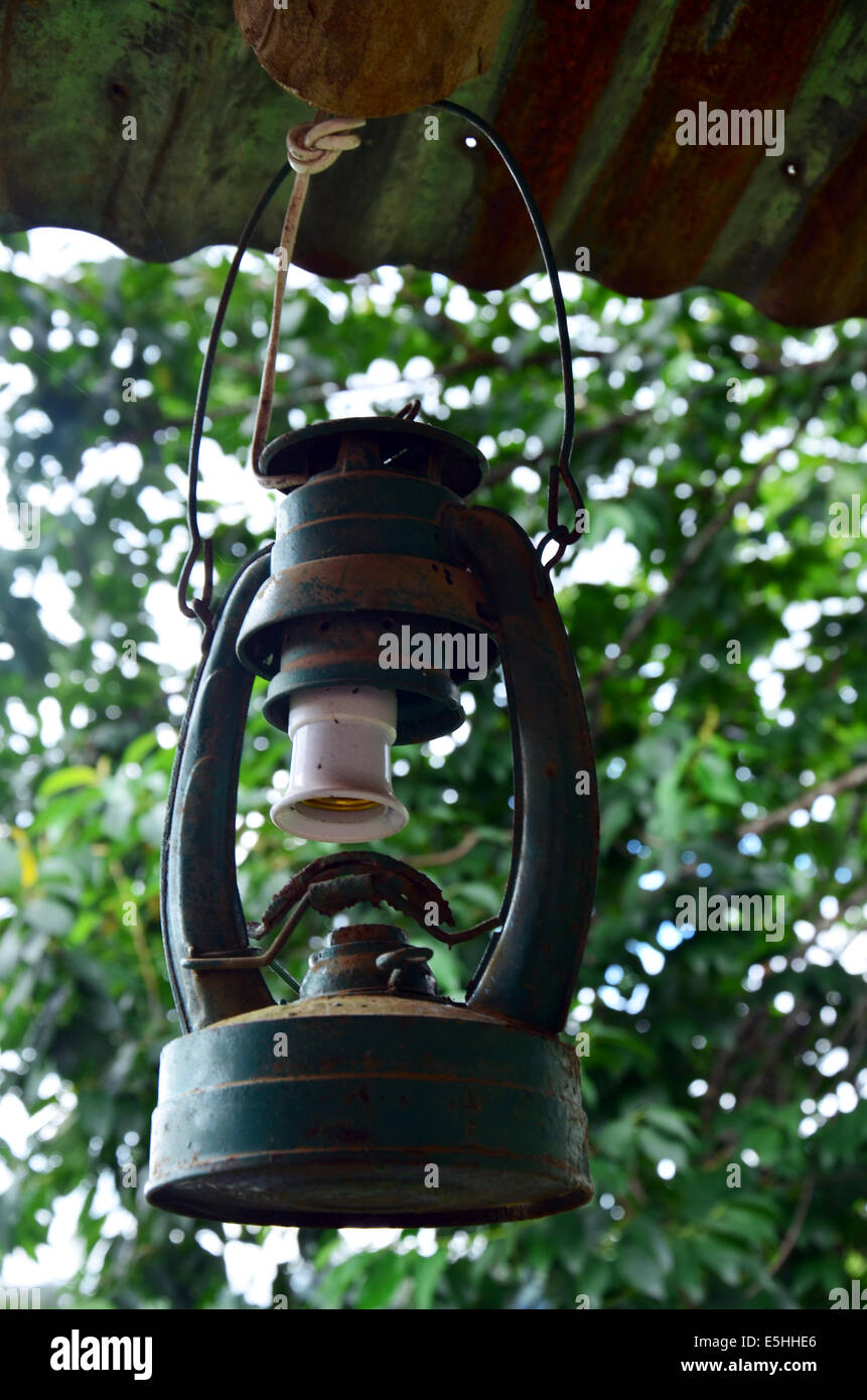 Broken Storm lantern or old Kerosene lamp Stock Photo - Alamy