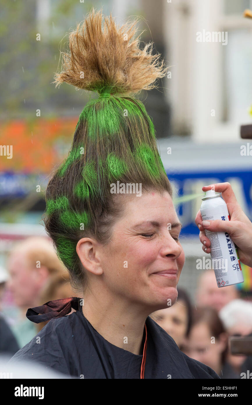 Artistic hairdressers street theatre performers hi-res stock ...