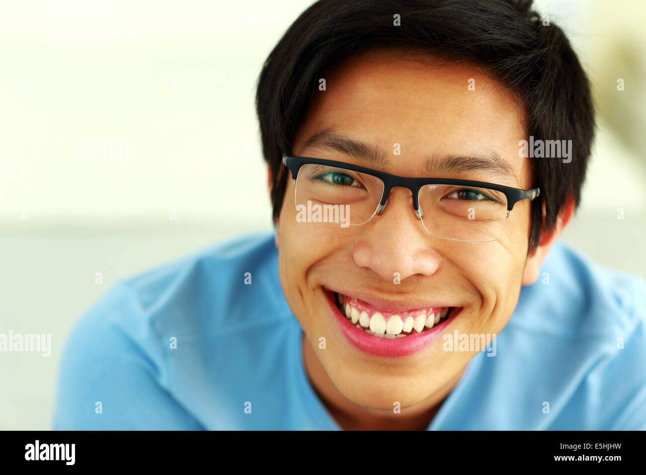 Closeup portrait of a happy asian man Stock Photo - Alamy