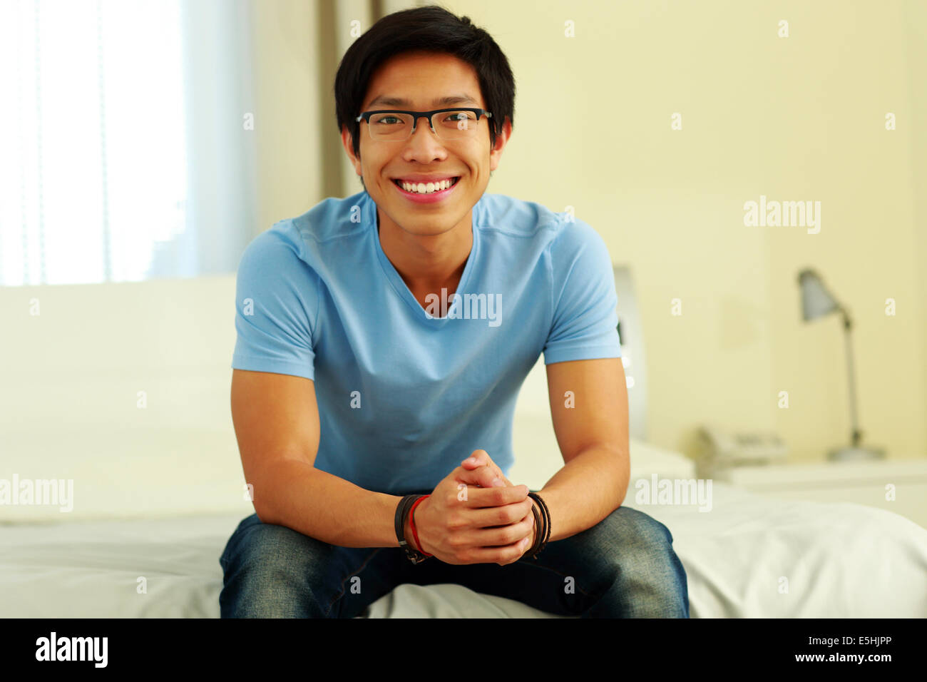 Happy handsome fit asian hi-res stock photography and images - Alamy