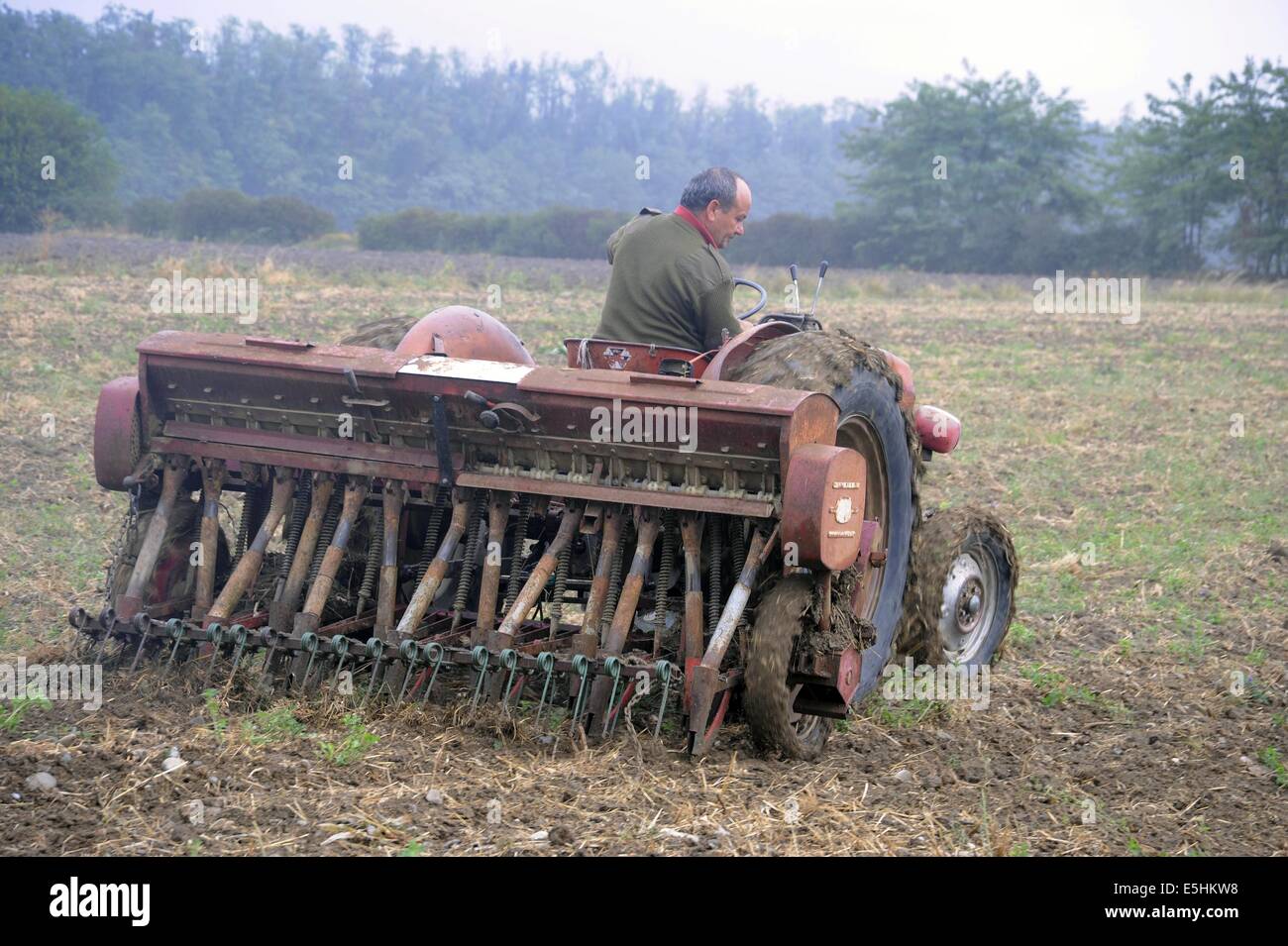 Old tractor at work in the fields hi-res stock photography and images ...