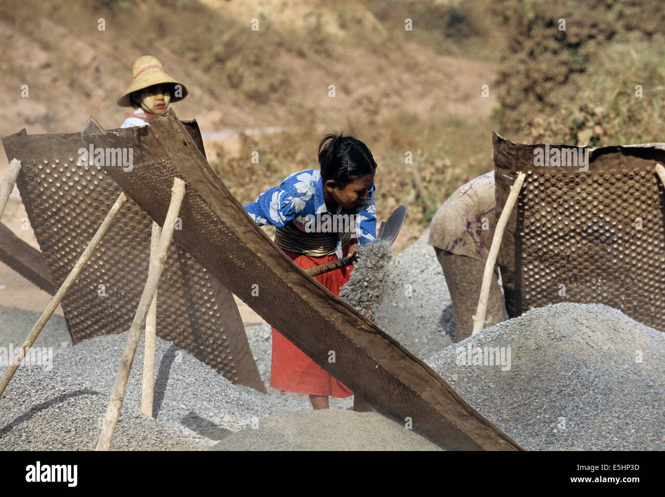 Child work on a road construction in Myanmar (Burma Stock Photo - Alamy