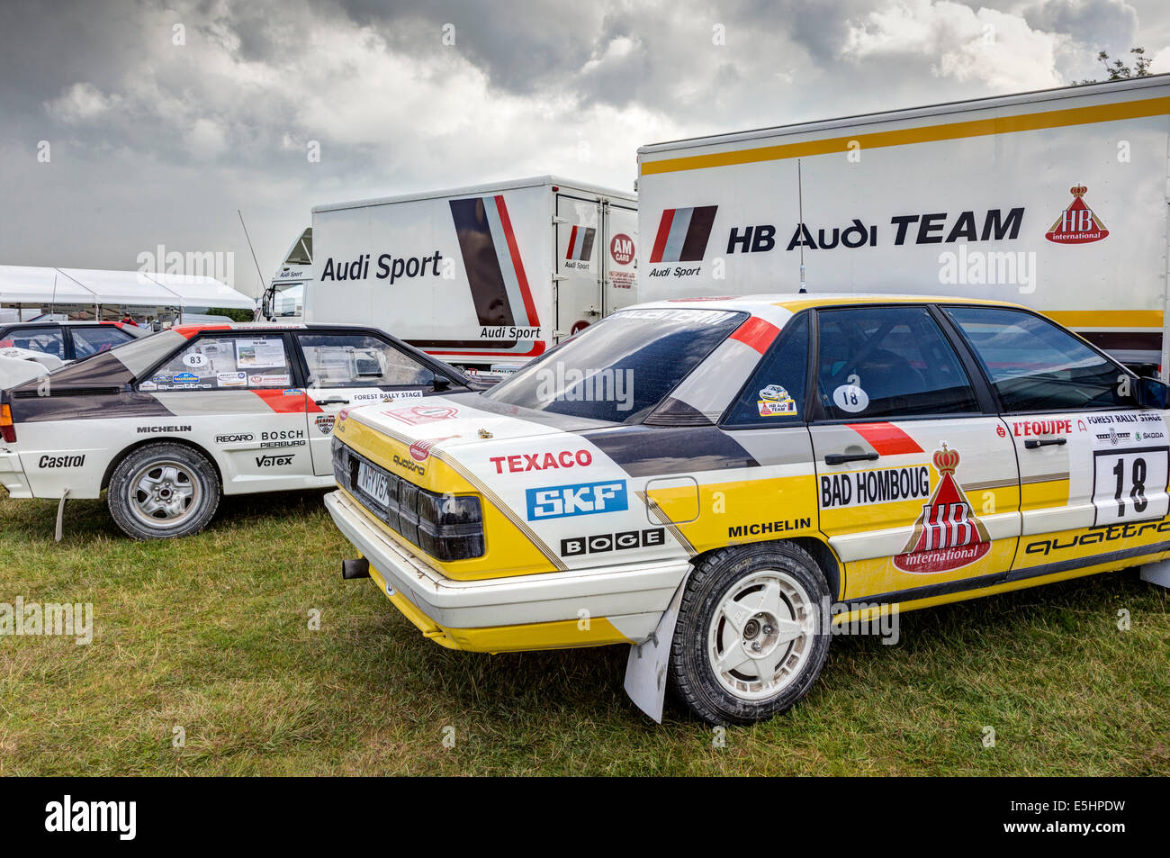 Audi rally car paddock area with transporters. 2014 Goodwood Festival ...