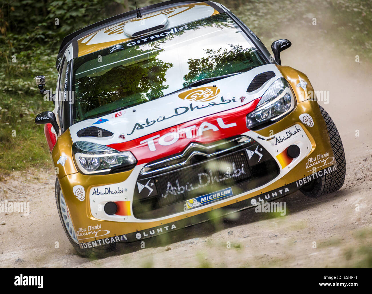 2013 Citroen DS3 WRC with driver Sebastien Loeb on the forest stage at ...