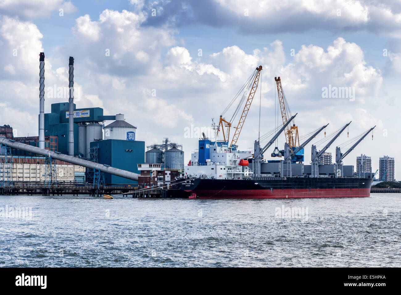 "Tate and Lyle" sugar refinery and factory with loading pier and cranes ...