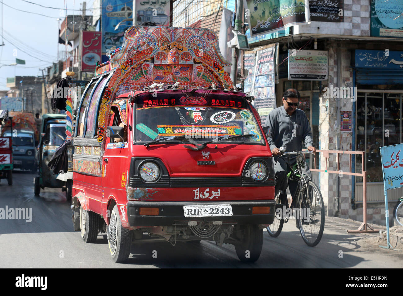Colorful decorated mini busses, taxi cabs, public transport in ...