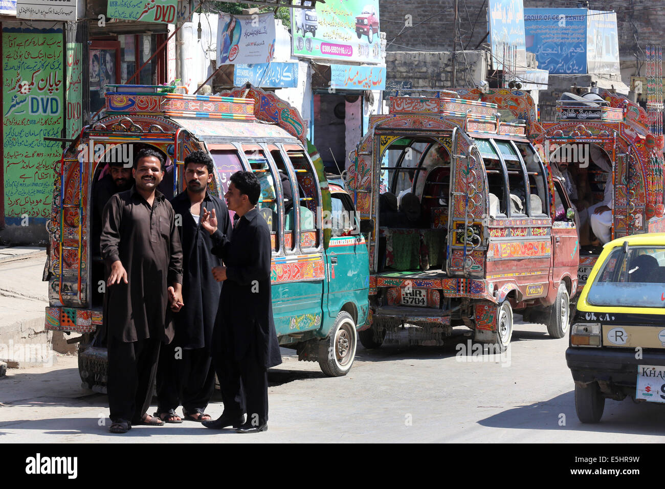 Colorful decorated mini busses, taxi cabs, public transport in ...