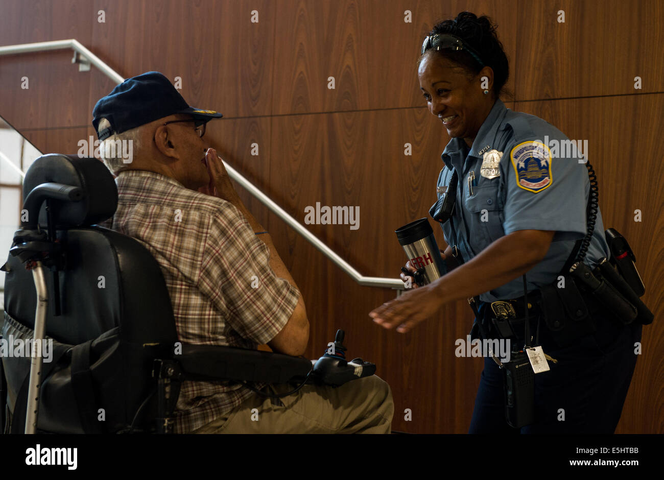 A retired veteran talks to a Maryland police officer June 18, 2014 at ...