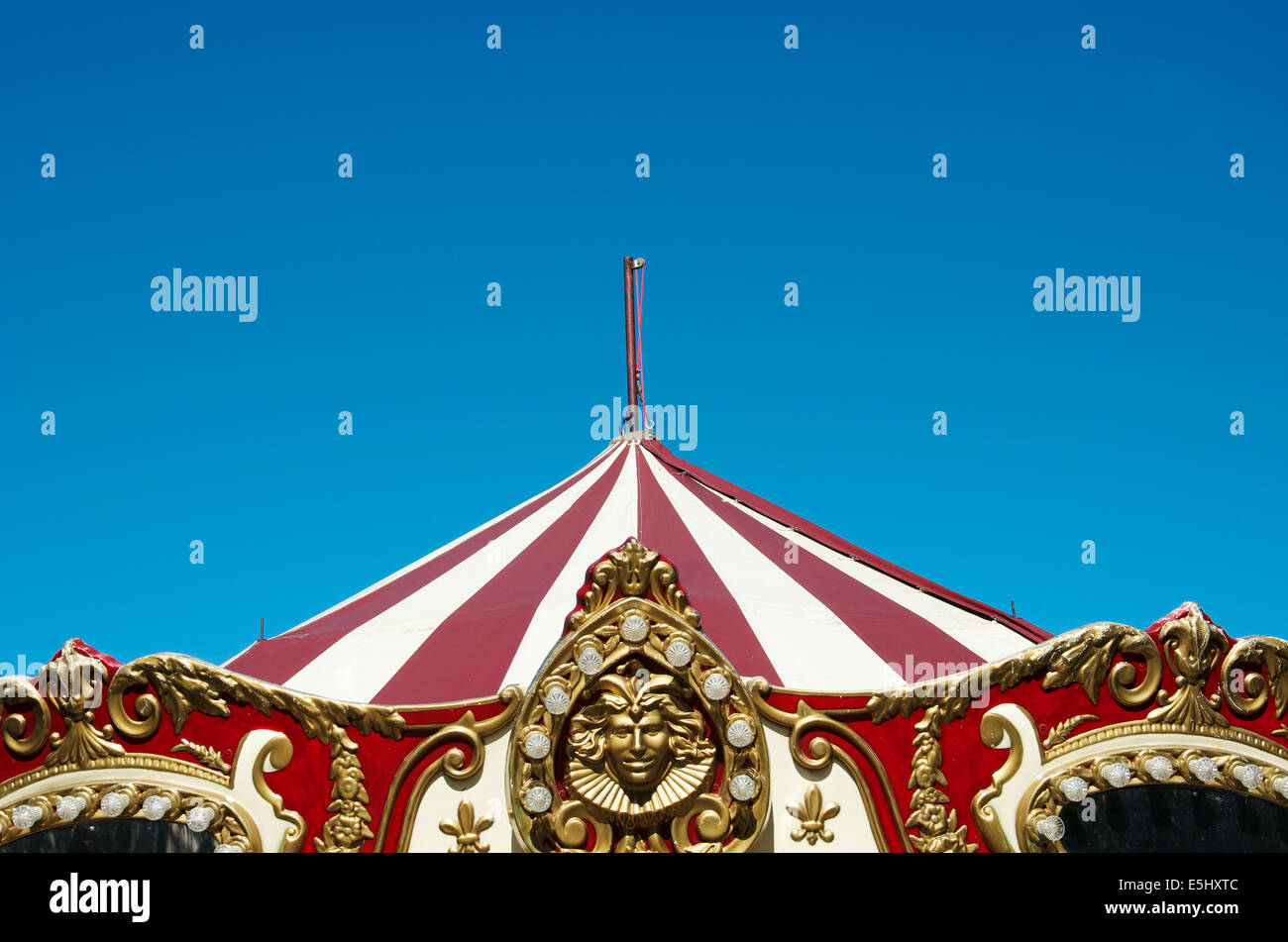 Elements of a colorful vintage carnival against clear blue sky Stock ...