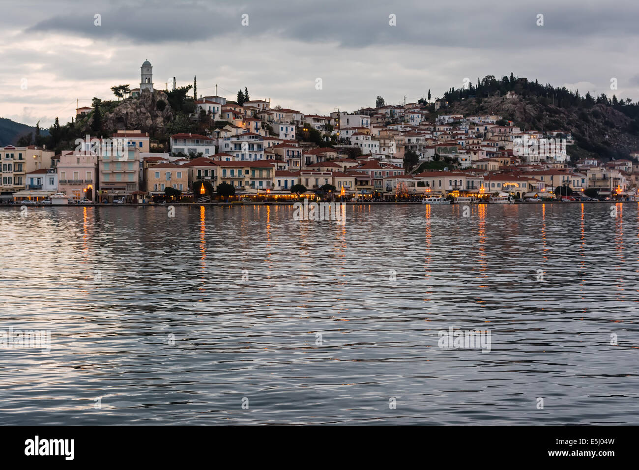 Greece, the port of Poros island at dusk Stock Photo - Alamy