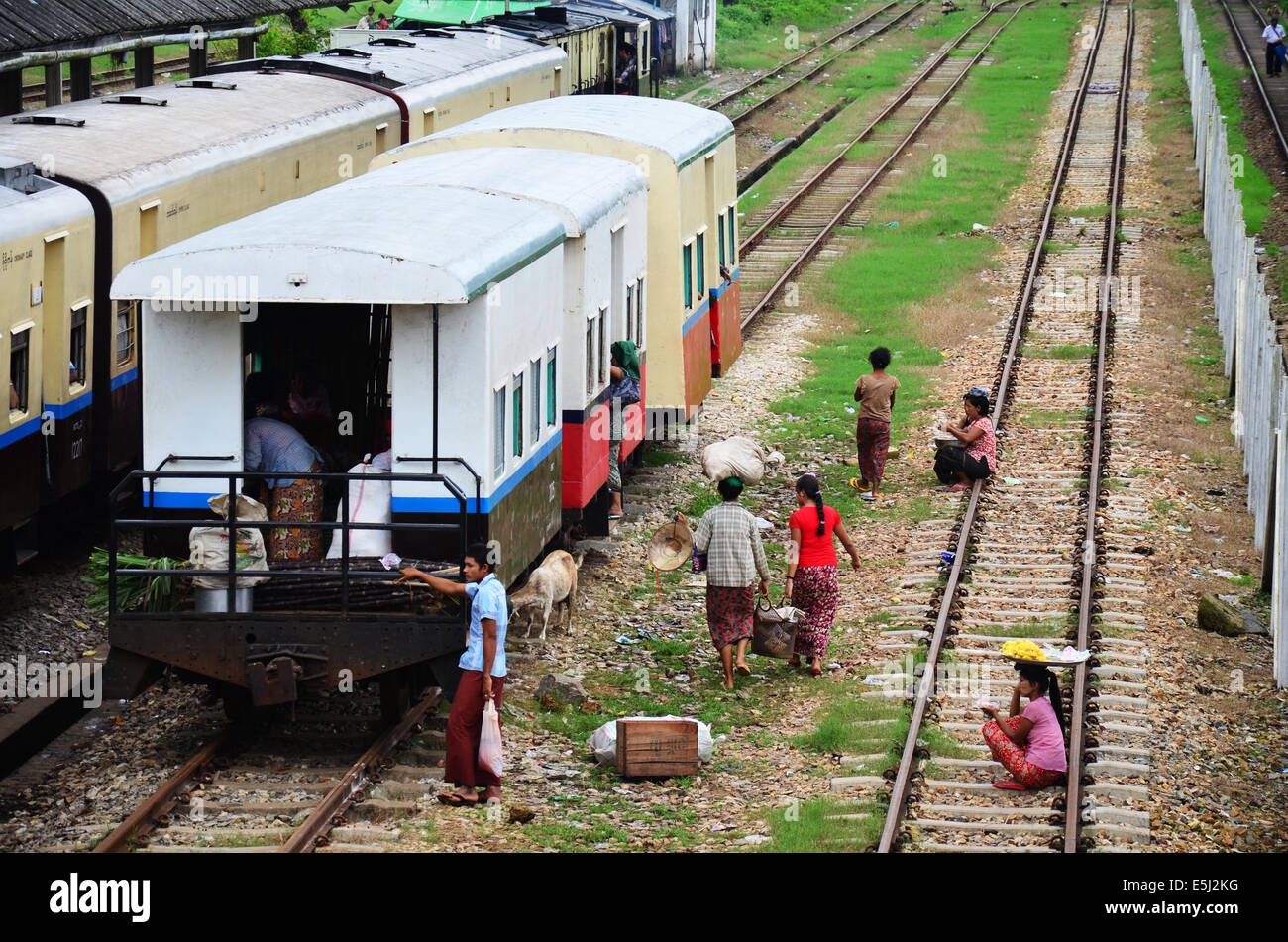 Burmese people waiting train and selling product at railway station in ...