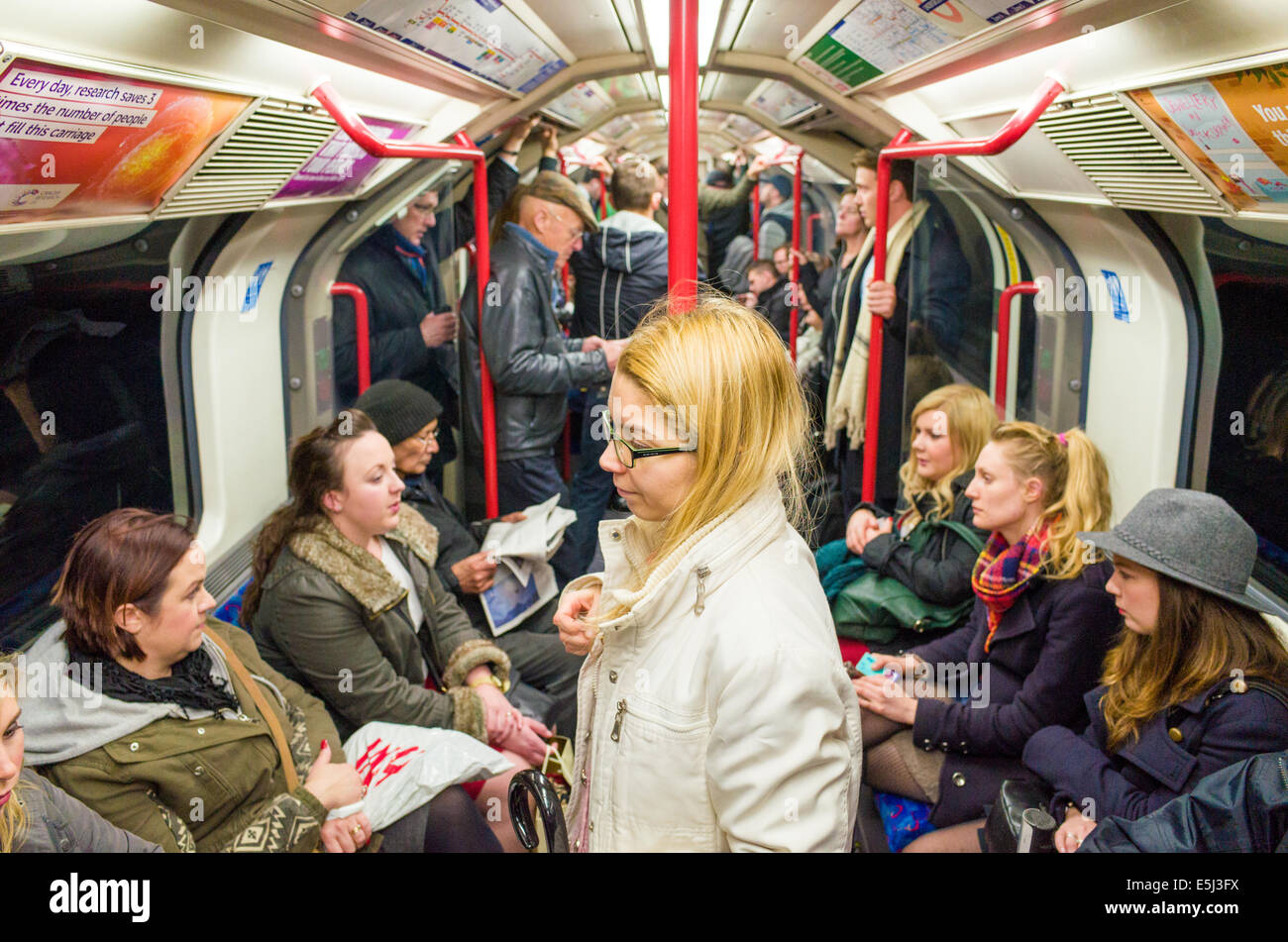 Passengers on Central Line carriage of London Underground train ...